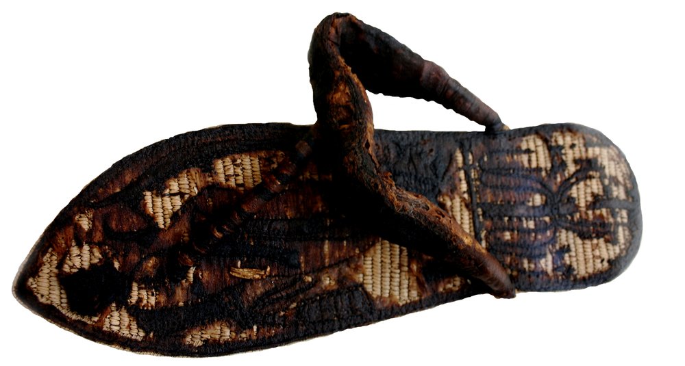 Tutankhamun's sandal decorated with bound prisoners and sema-tawy ...