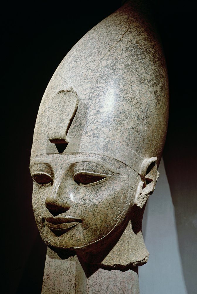Colossal head of Amenhotep III by Egyptian 18th Dynasty
