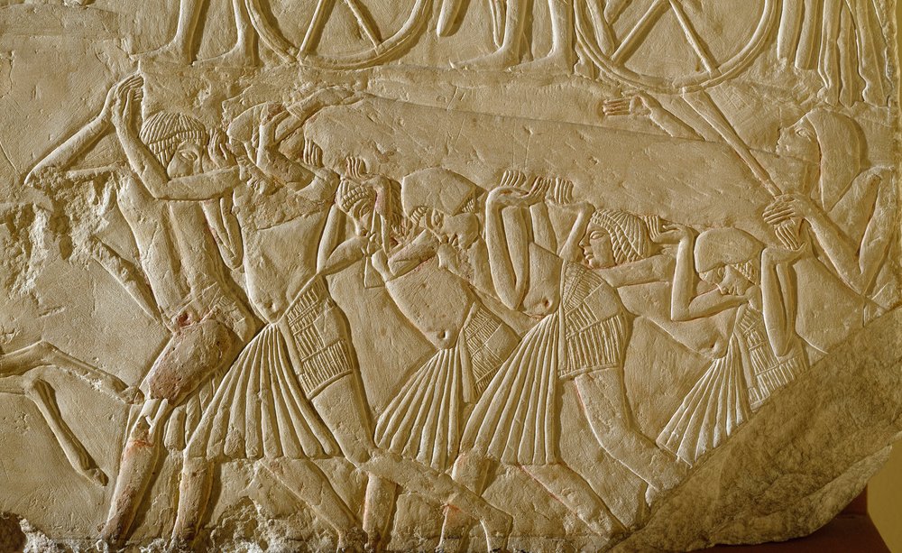 Egyptian antiquity: slaves carrying an obelisk during the great works ...