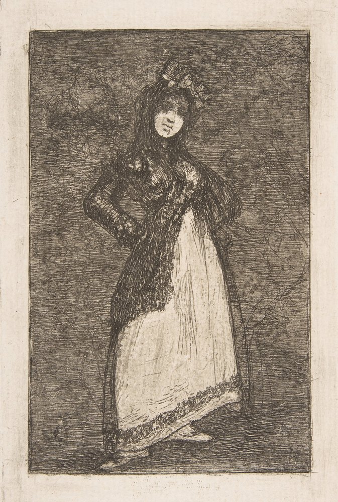 A Maja standing against a dark background