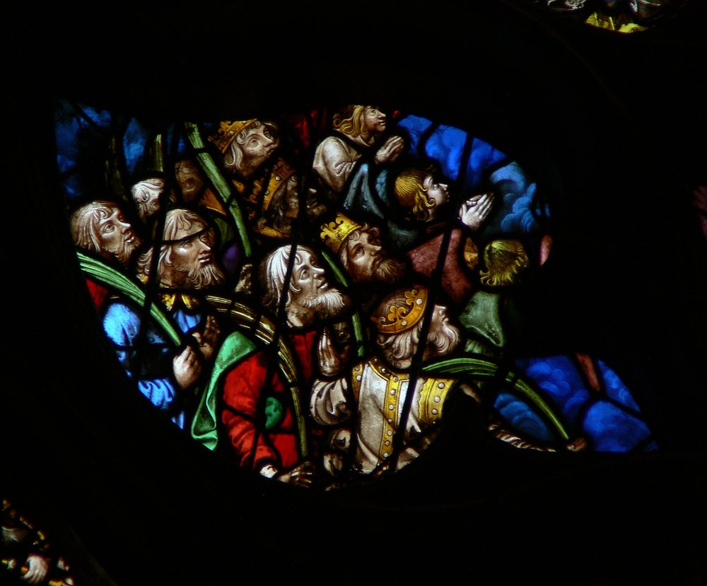The west rose window depicting a scene from the Book of Revelation ...