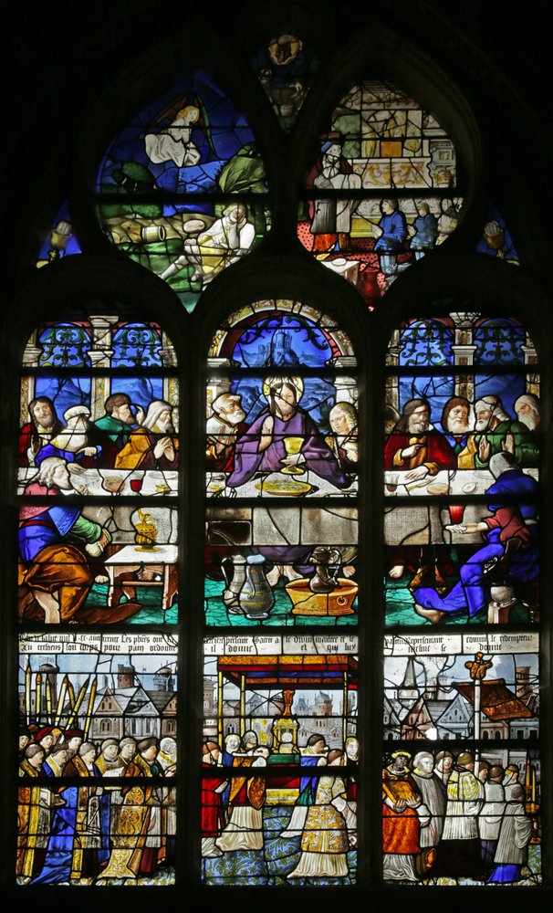 Window depicting the Last Supper and the procession of the Holy Sacrament