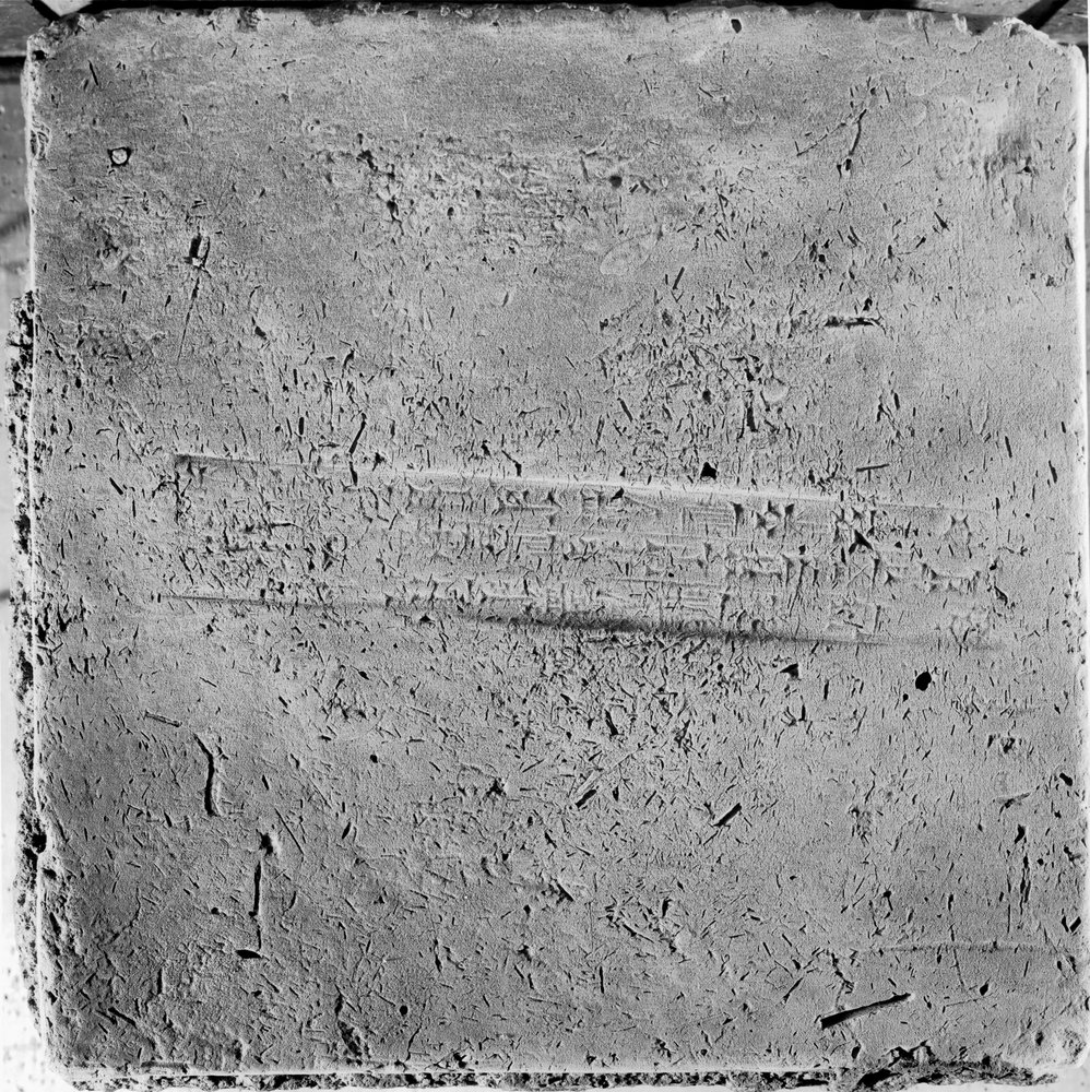 Cuneiform inscription on an ancient Babylonian brick