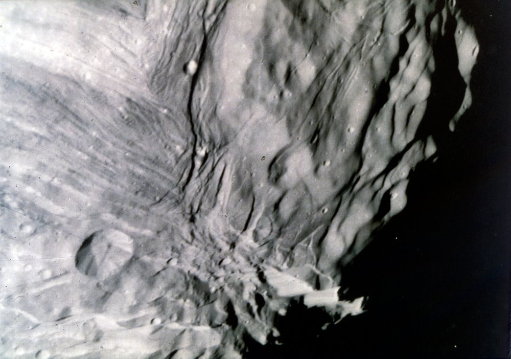 Miranda, One of the Moons of Uranus, Seen from Voyager 2