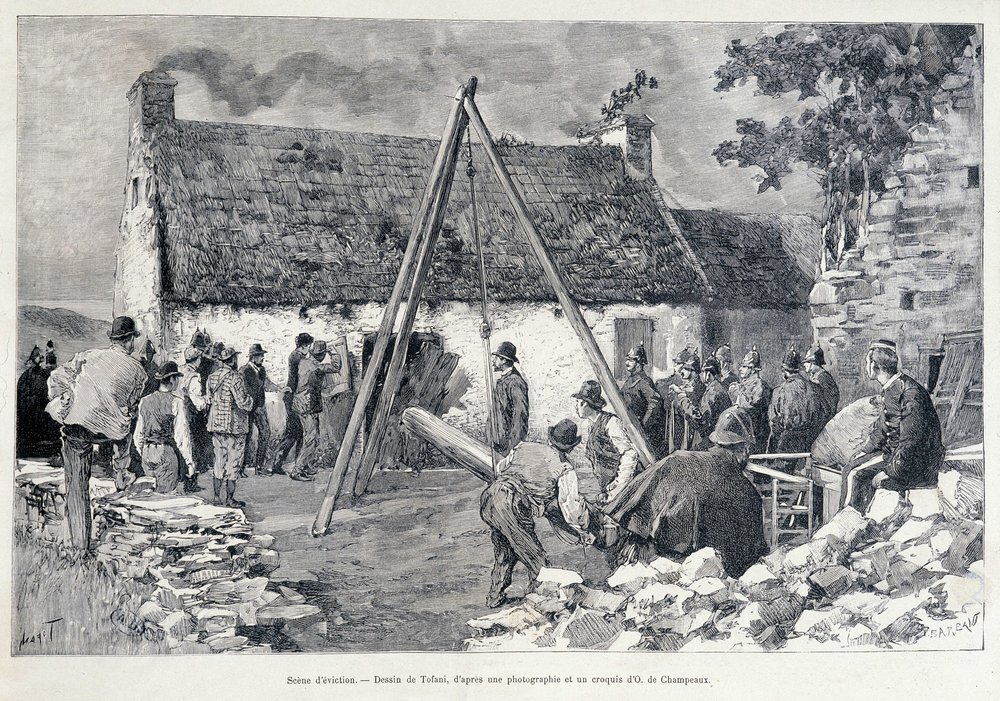 Men running through a door with the help of a belly tree to expel the ...