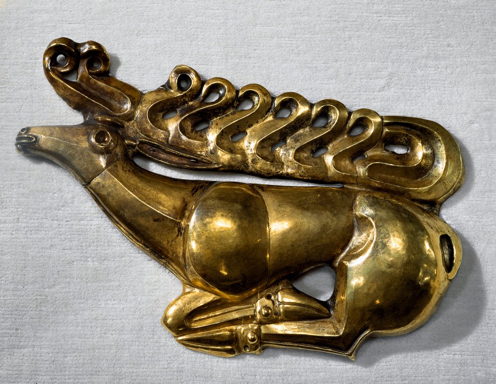 Scythian art: shield emblem in the shape of a deer. Gold object from ...