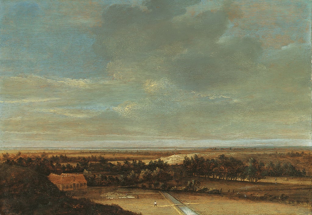 An extensive dune landscape with a farmhouse and a bleaching ground