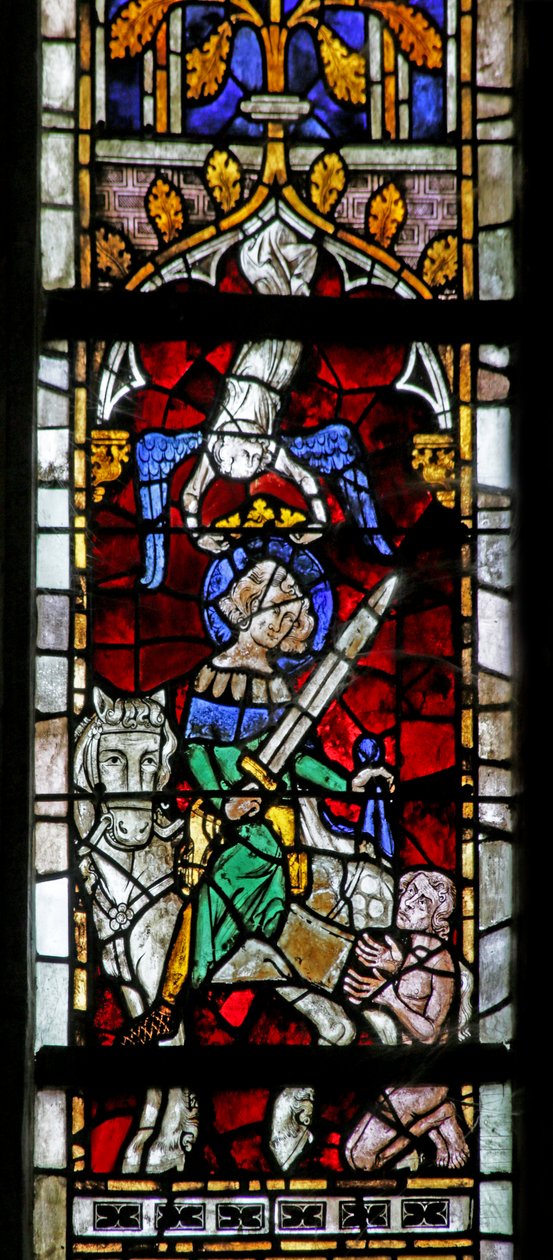 Window depicting St Martin dividing his cloak with a beggar