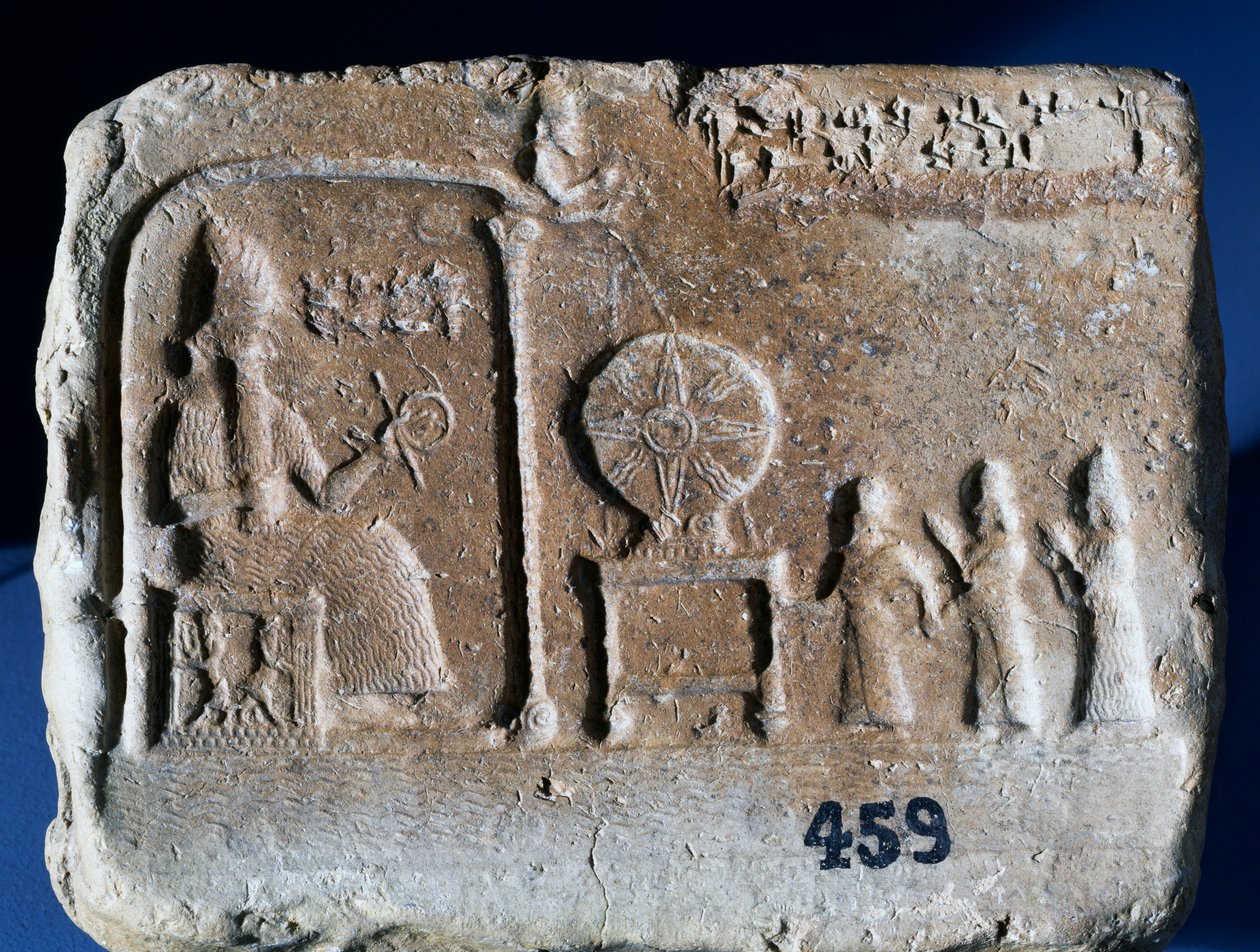 Votive tablet depicting Shamash, the sun-god of Sippar, seated in his ...