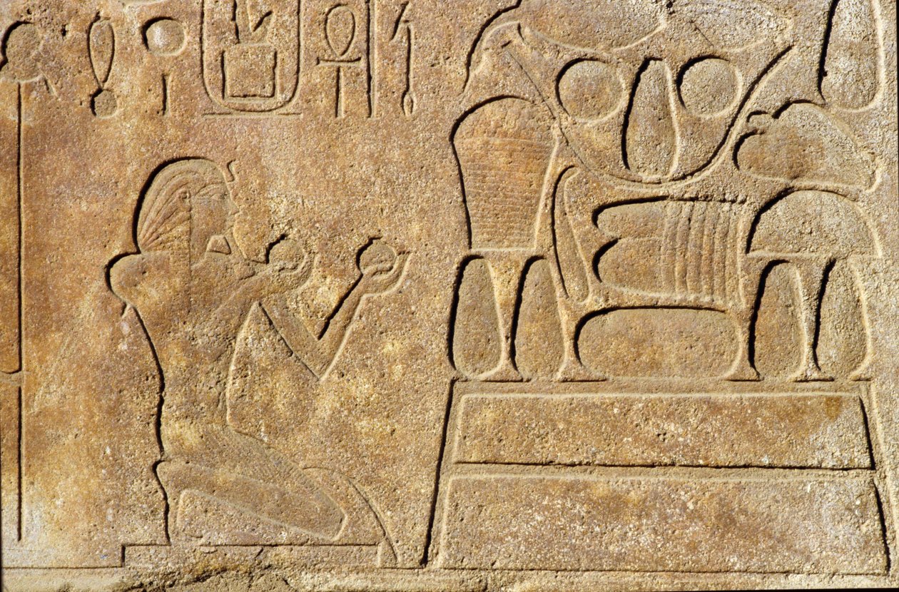 Queen Hatshepsut kneeling before a table of offerings, Temple of Amun ...