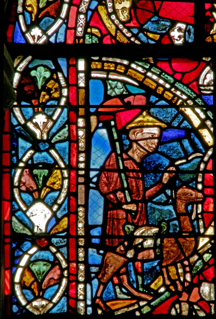 Window depicting a scene from the Prodigal Son story: departs