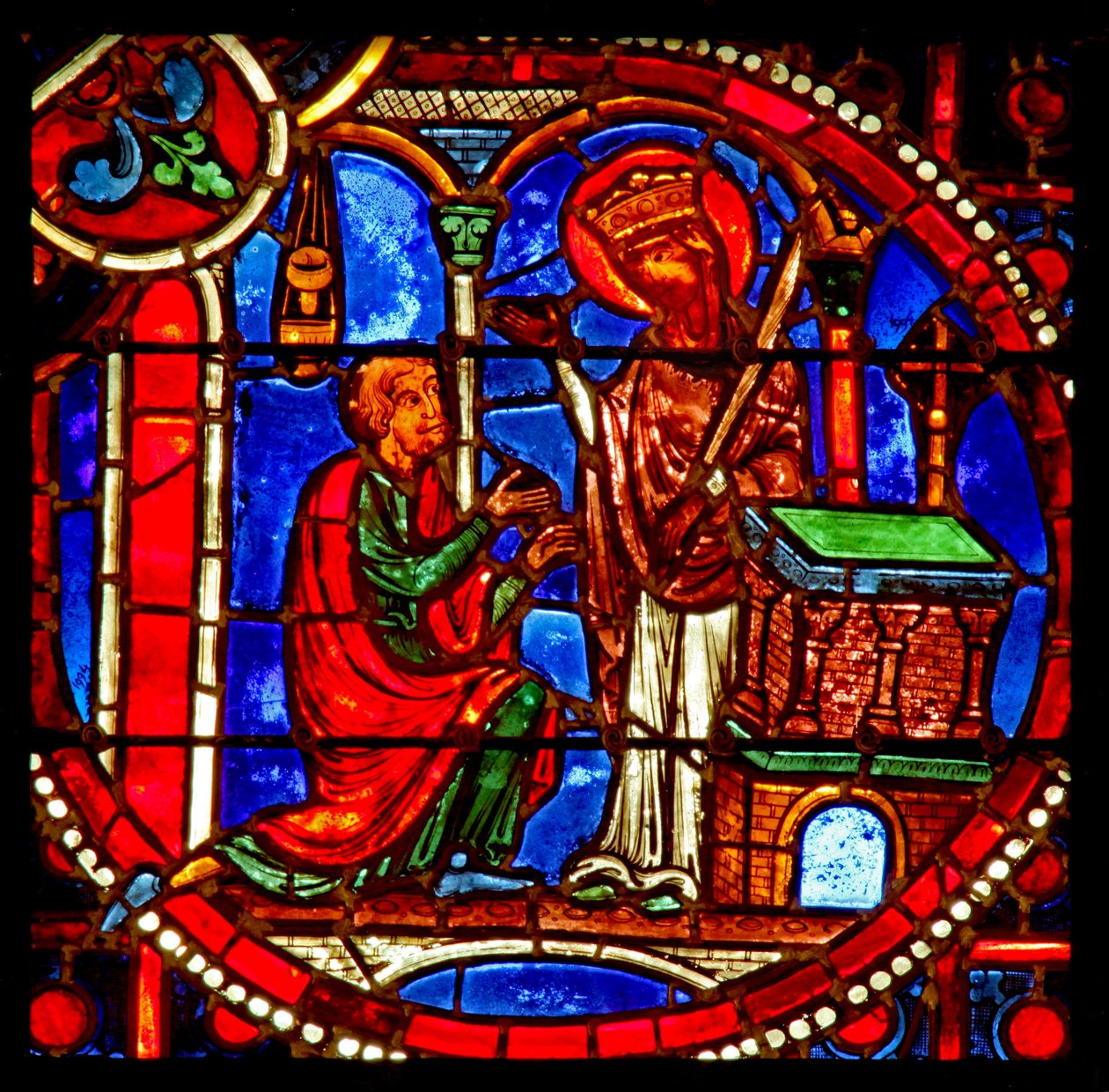 Window depicting a scene from the Theophilus story: he prays before a ...