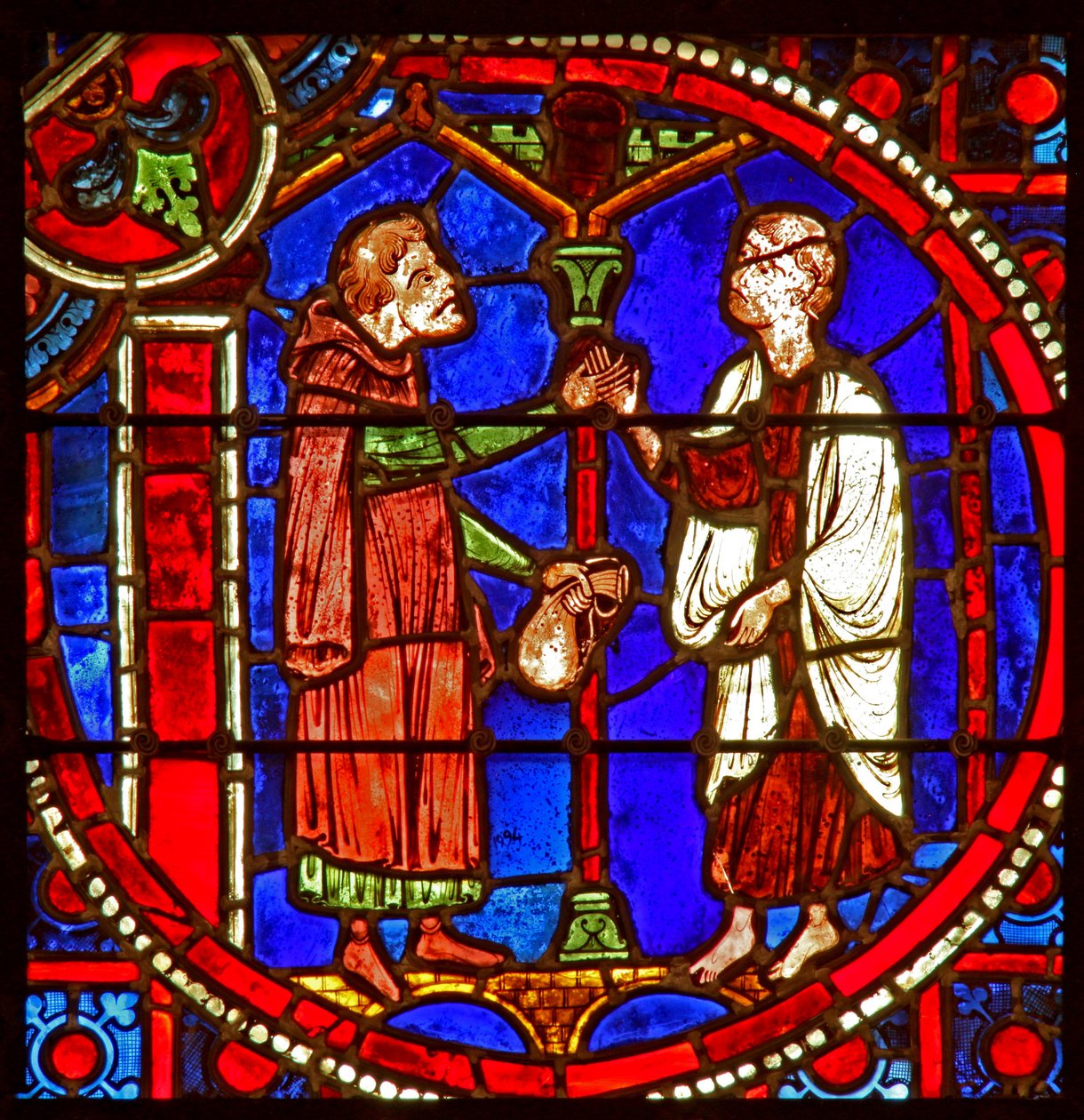 Window depicting a scene from the Theophilus story: he solicits the ...