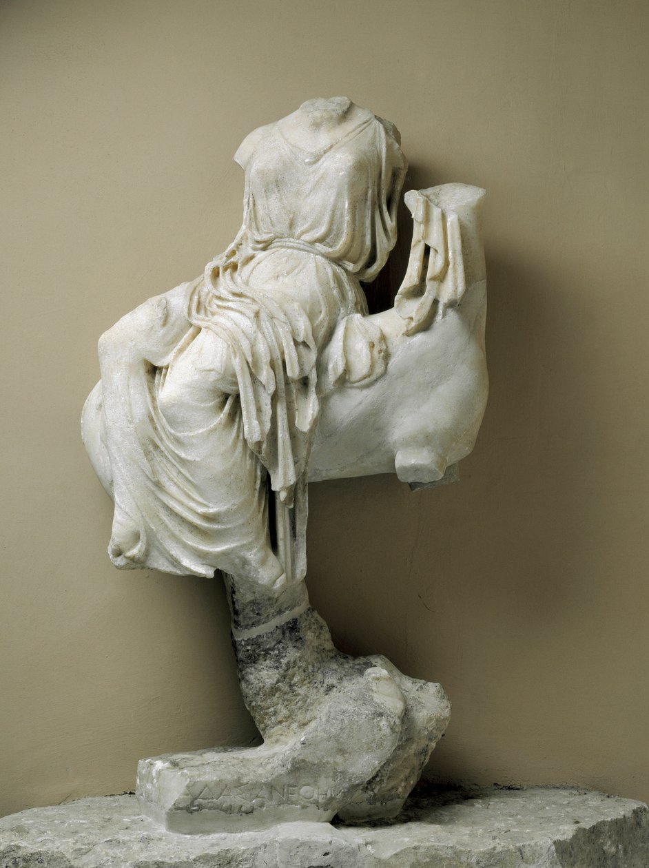 Female statue draped as a votive offering by Greek