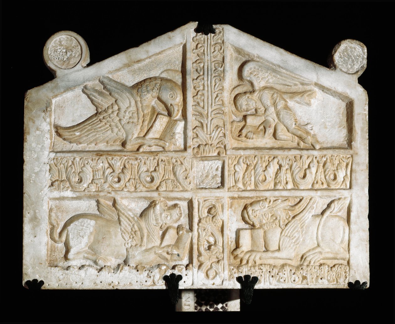 Marble sculpture with symbols of evangelists (tetramorph)