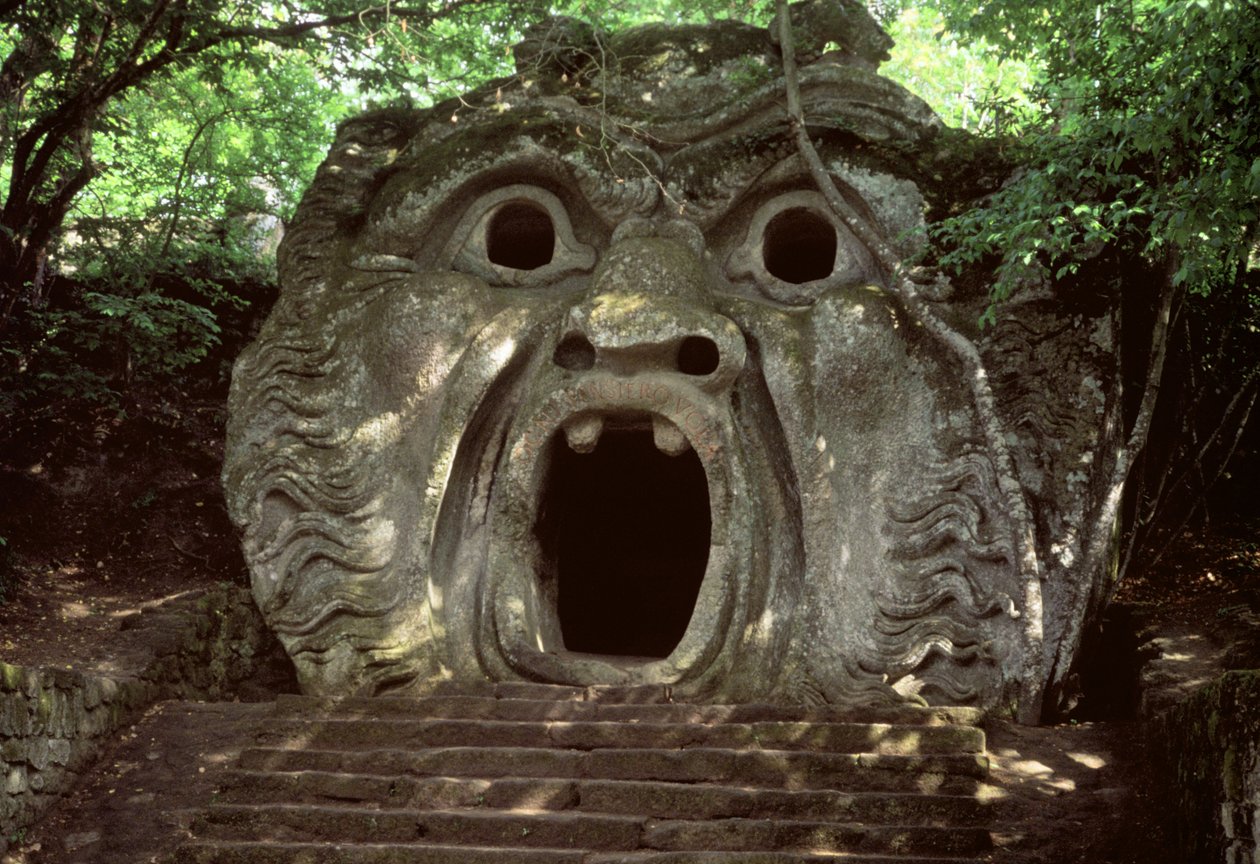 Mouth of a fantastical cave, stone sculpture in the Parco dei Mostri