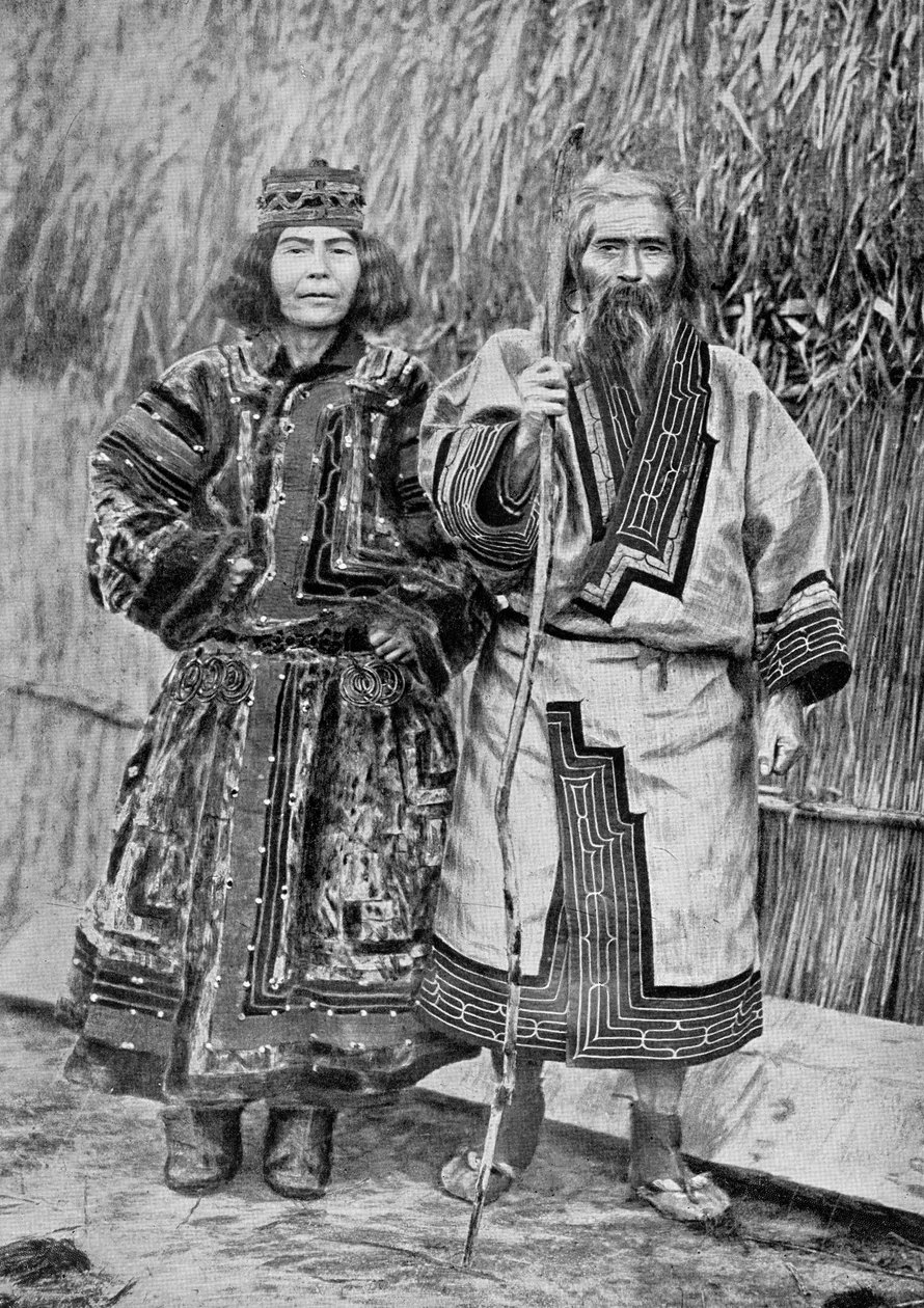 Ainu Couple Outside the Traditional Ainu Home of a Reed Thatched Hut ...