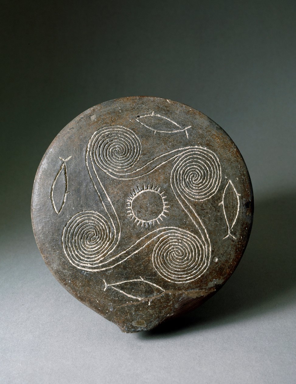 Circular disc of Naxos in terracotta by Minoan