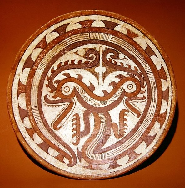 Plate depicting twin crocodile heads on a coiled serpent body, Late ...