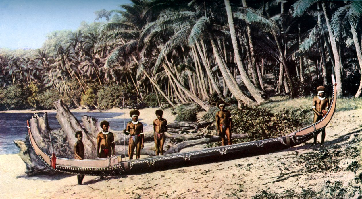 Native canoe on a palm shaded beach, Solomon Islands
